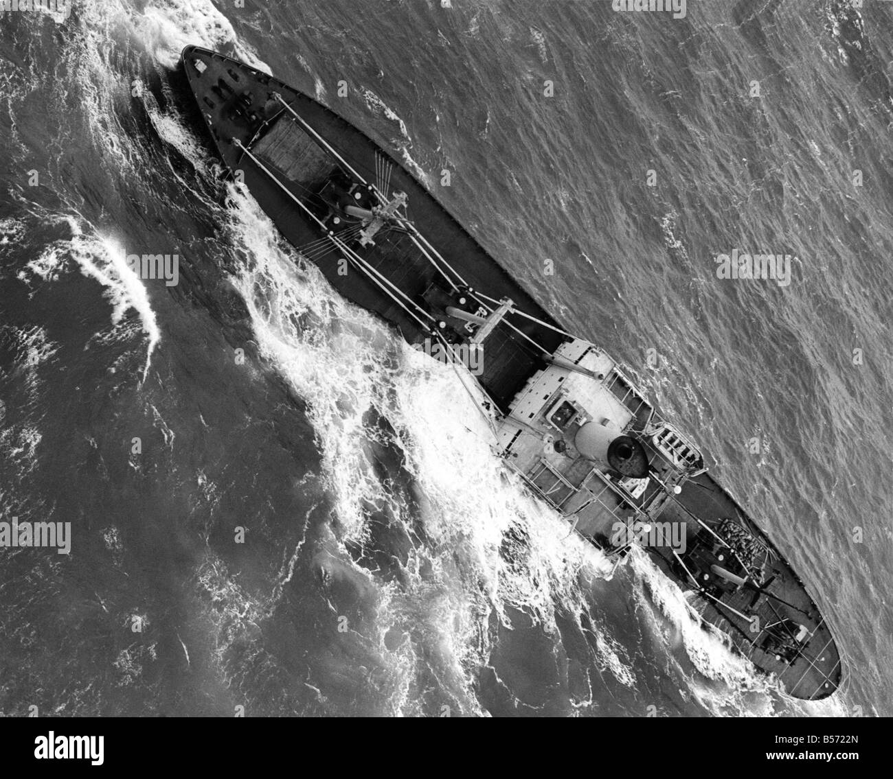 An aerial view of the Flying Enterprise being pounded by heavy seas. It ...
