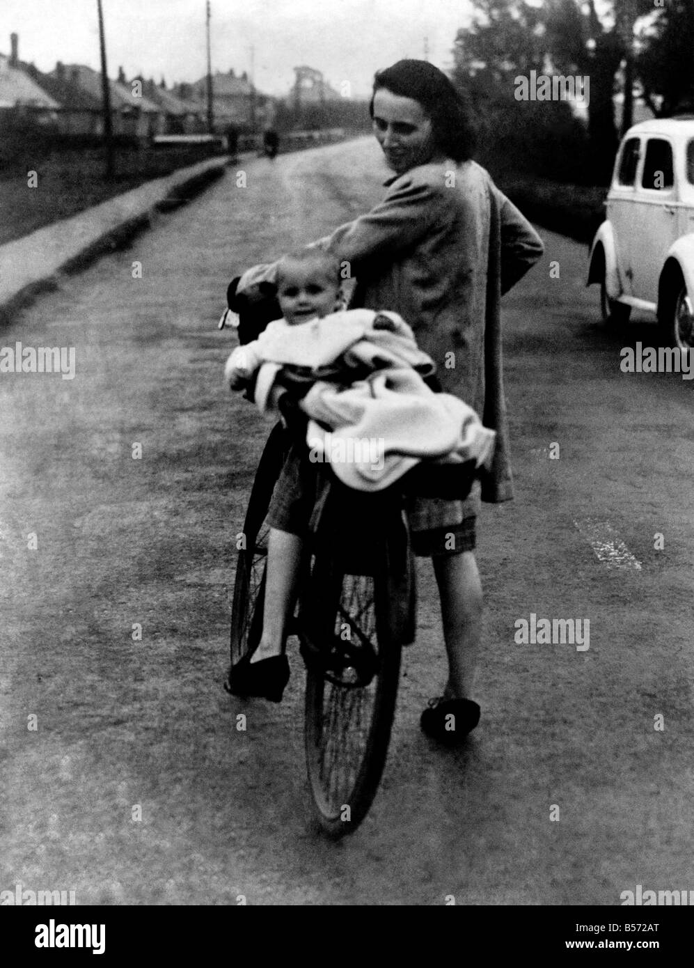 World War II: Britain Blitz. Women and baby seen here leaving the city ...