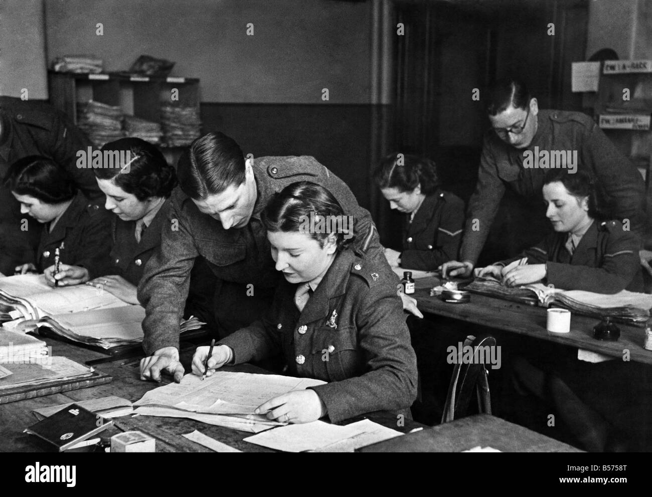 World War II: Women. Members of the ATS take over the pay corps work ...