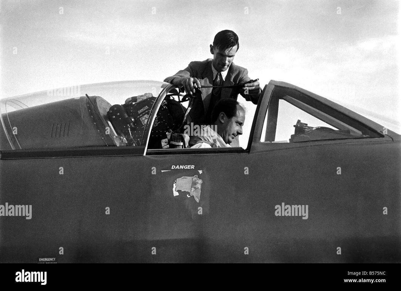 Test pilot Neville Duke in the cockpit of a Hawker Hunter jet fighter ...
