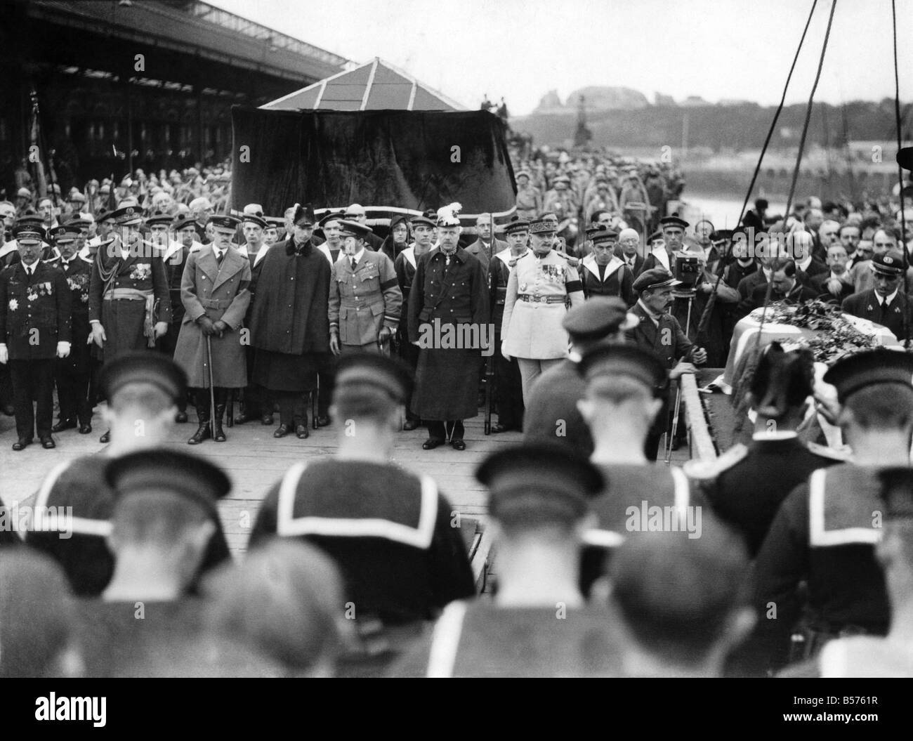 R101 airship crash. Coffins of the victims are carried aboard HMS ...