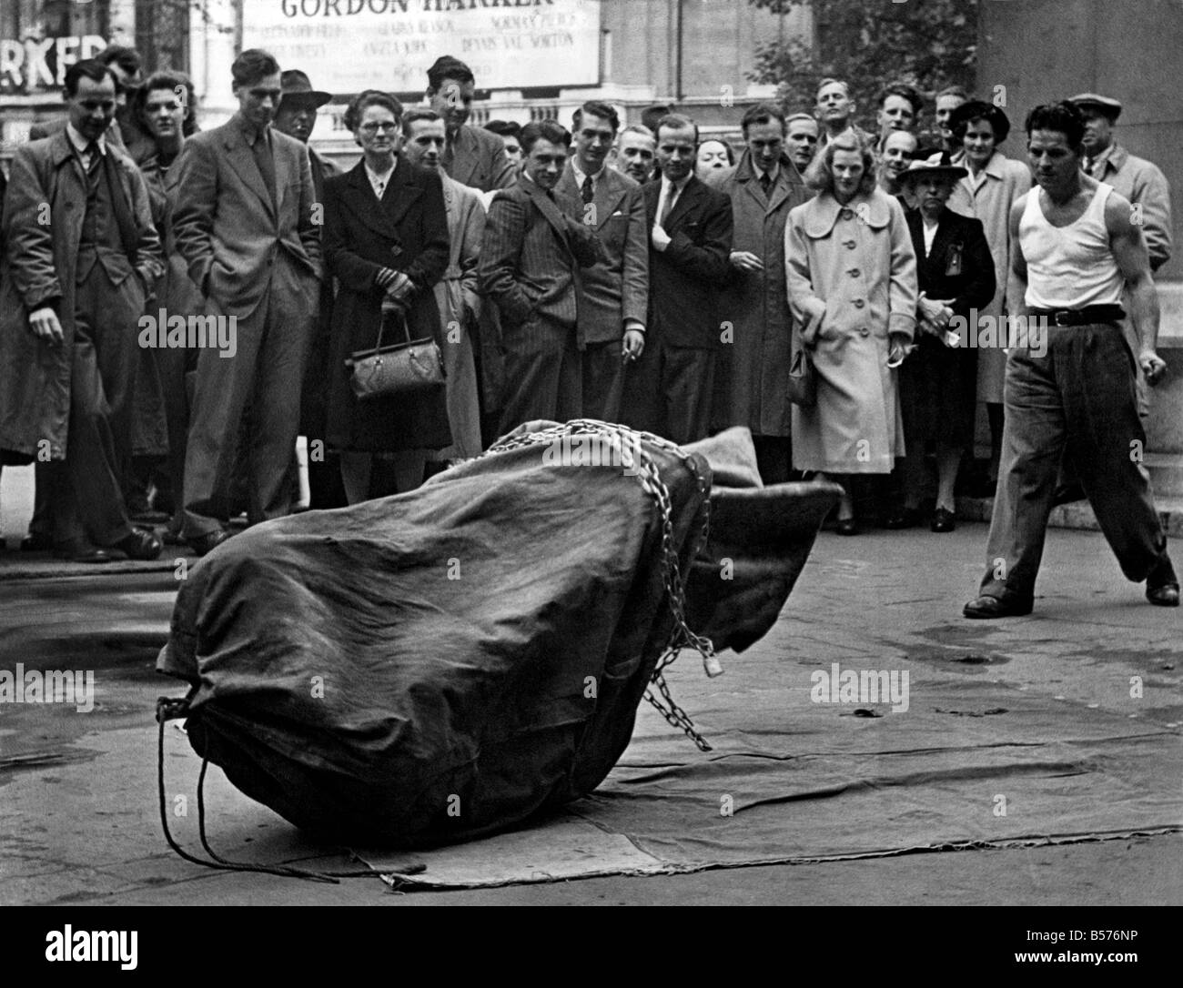 Streets Entertainment. A escapologist attempts to escape from his ...