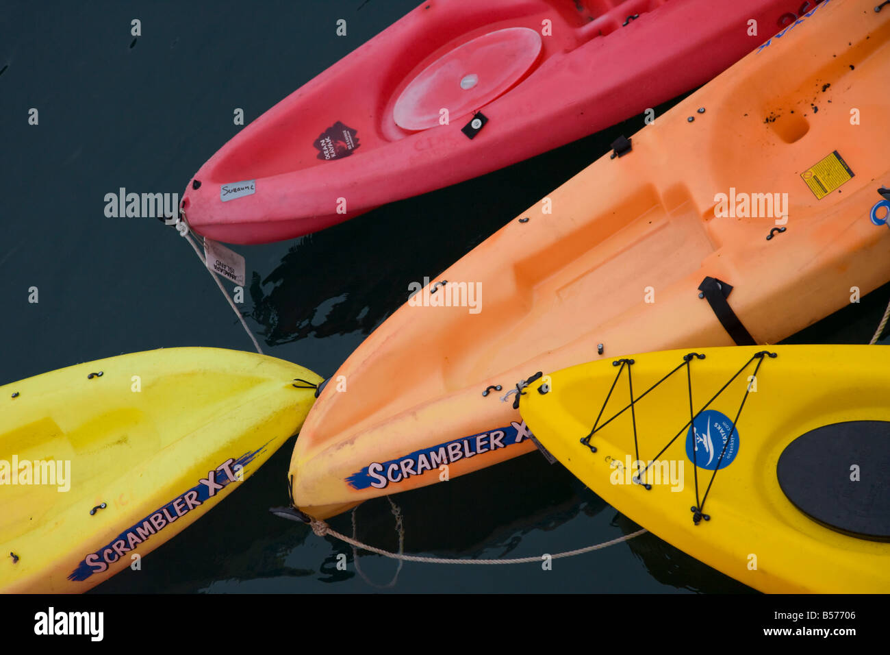 Kayaks tied together Stock Photo - Alamy