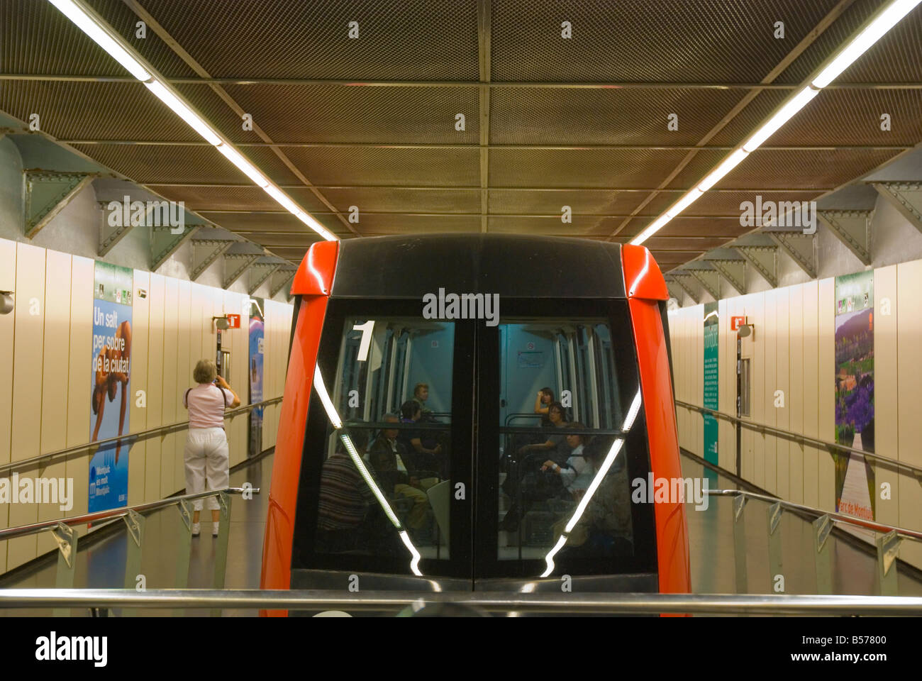 Funicular train at Parallel station waiting to go up to Montjuic in ...