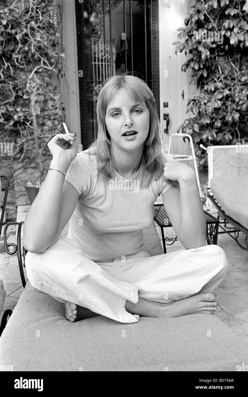 1970s woman smoking cigarette Black and White Stock Photos & Images - Alamy