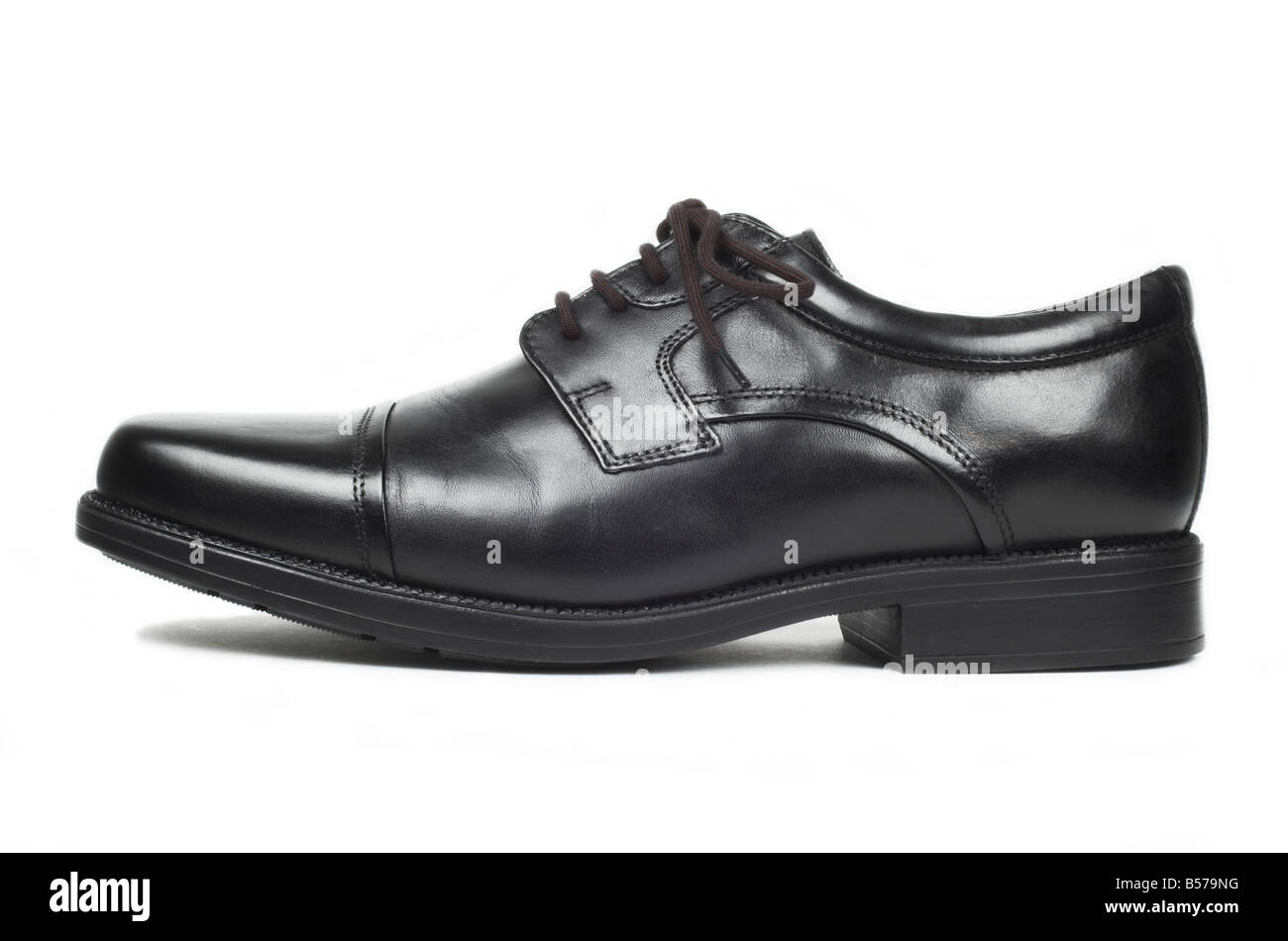 A single black work leather shoe Stock Photo - Alamy