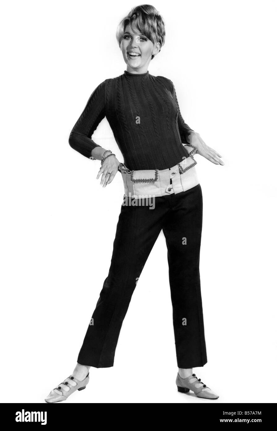 Reveille Fashions 1966: Delia Freeman modelling trouser suit. November ...