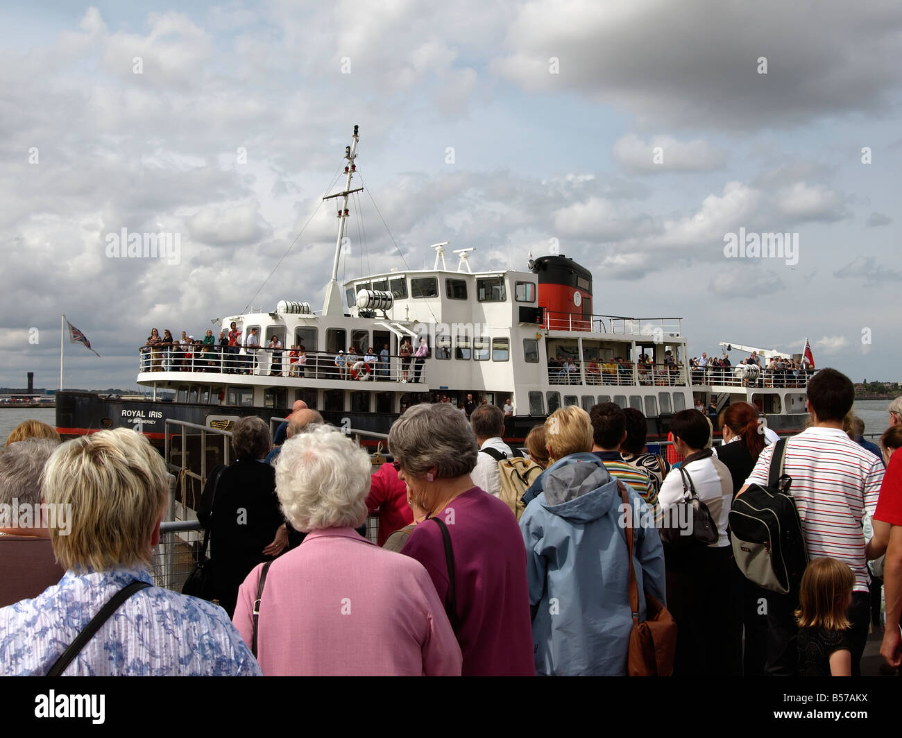 Passengers queue for the Mersey Ferry - Royal Iris - Liverpool, UK ...