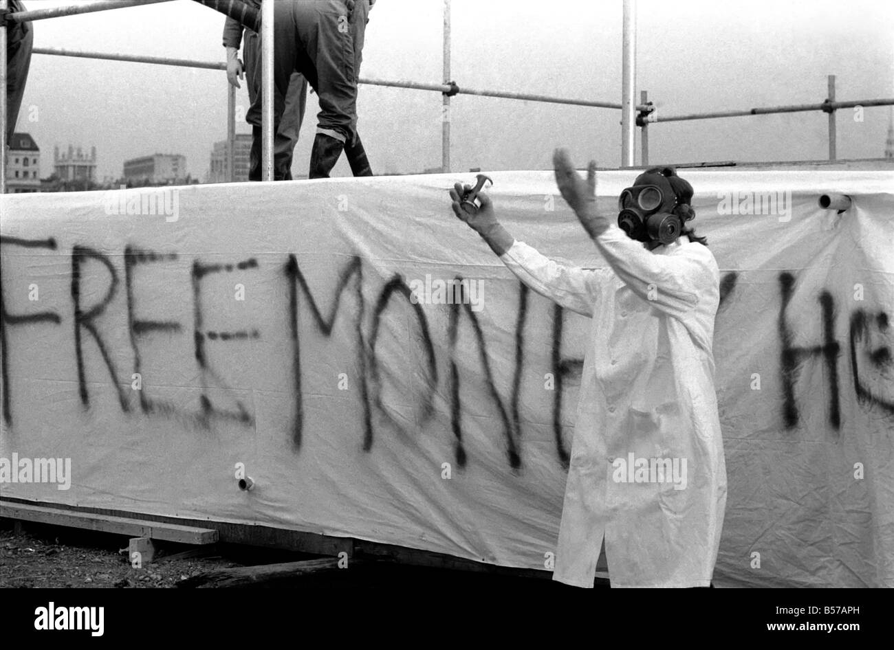 Ringo Starr with gas mask on calling the people to come for their free ...