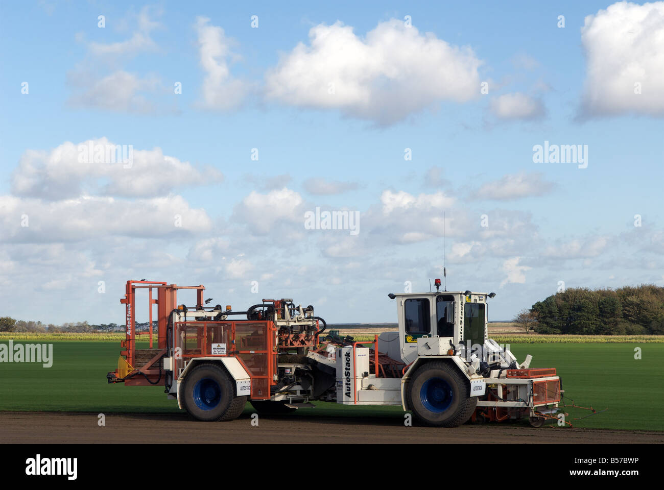 Automated turf cutting machine, Bawdsey, Suffolk, UK Stock Photo - Alamy
