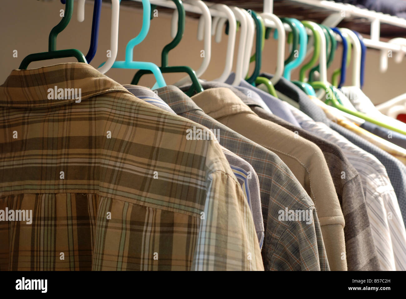 Casual shirts on a rack Stock Photo - Alamy