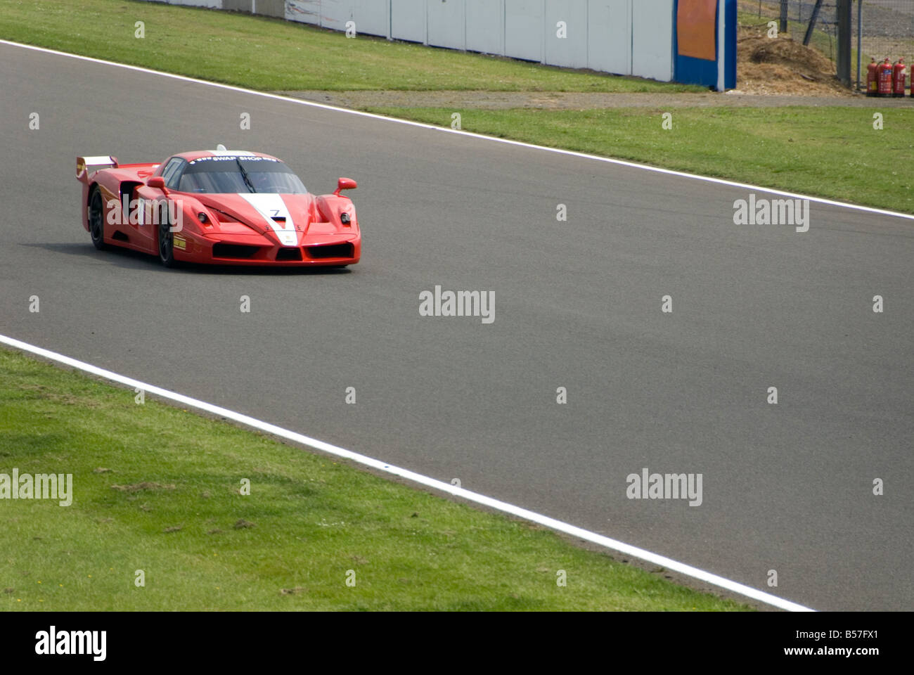 Red Ferrari FXX racing Stock Photo - Alamy