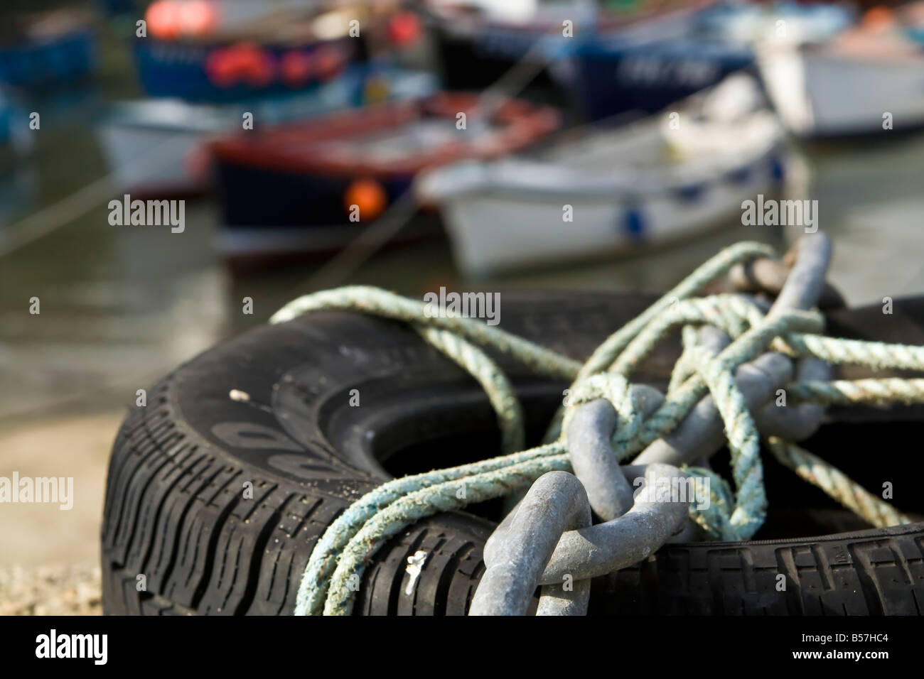 Rope on an old tyre Stock Photo - Alamy