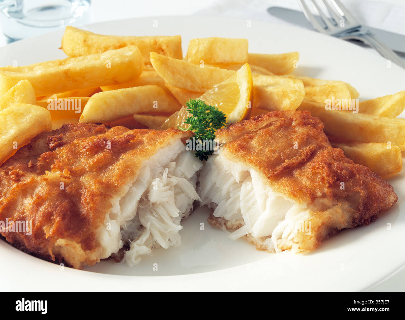 Cod and chips traditional English editorial food Stock Photo - Alamy