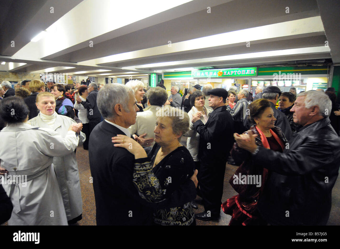 Old Ukrainain people dancing inside a metro station in Kiev, Ukraine ...