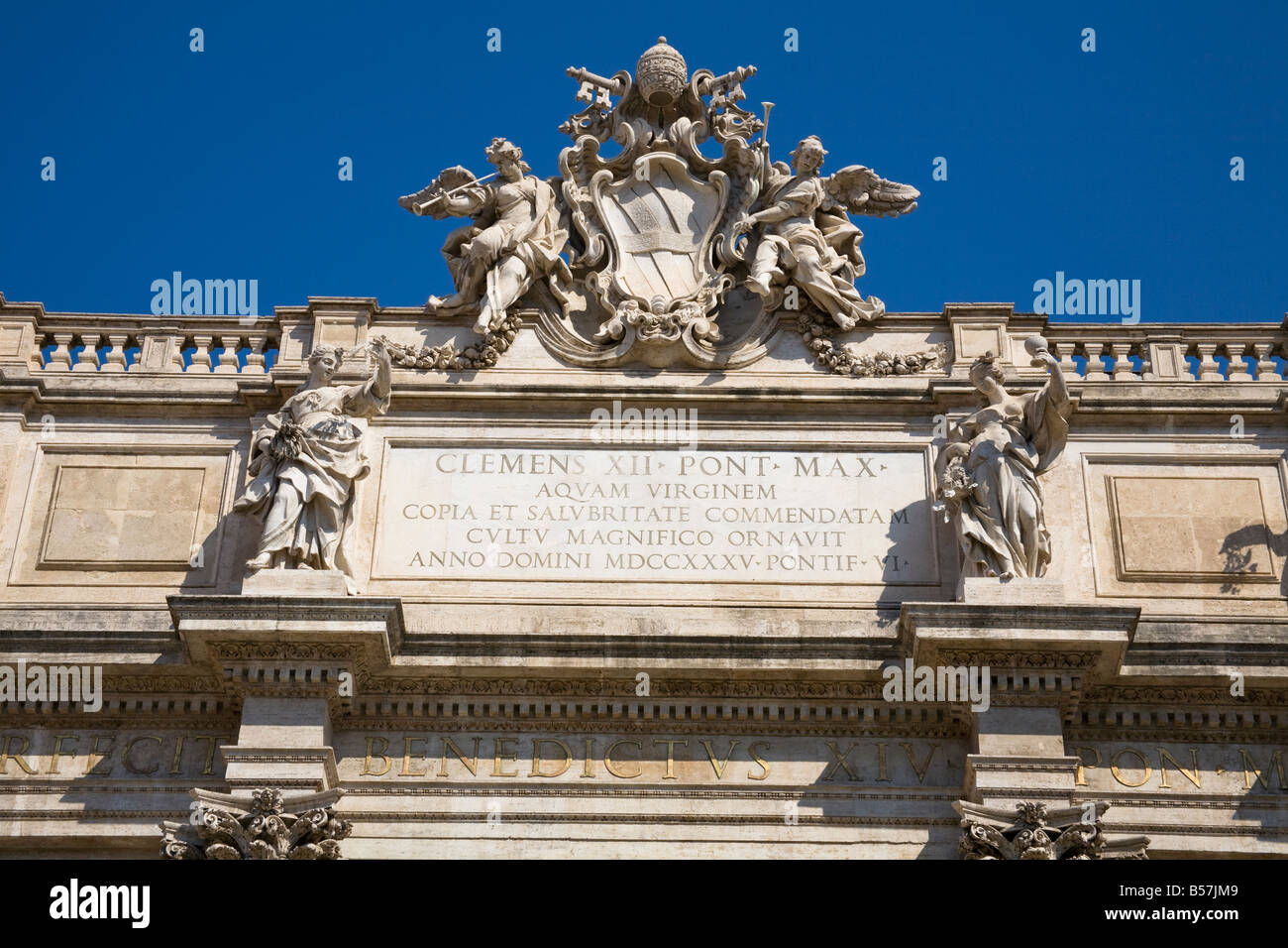 Statues and inscription on top of the Trevi Fountain, Piazza di Trevi ...