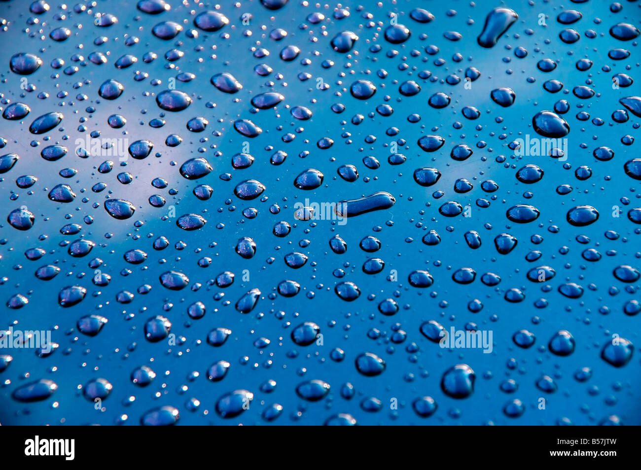Raindrops on car roof hi-res stock photography and images - Alamy