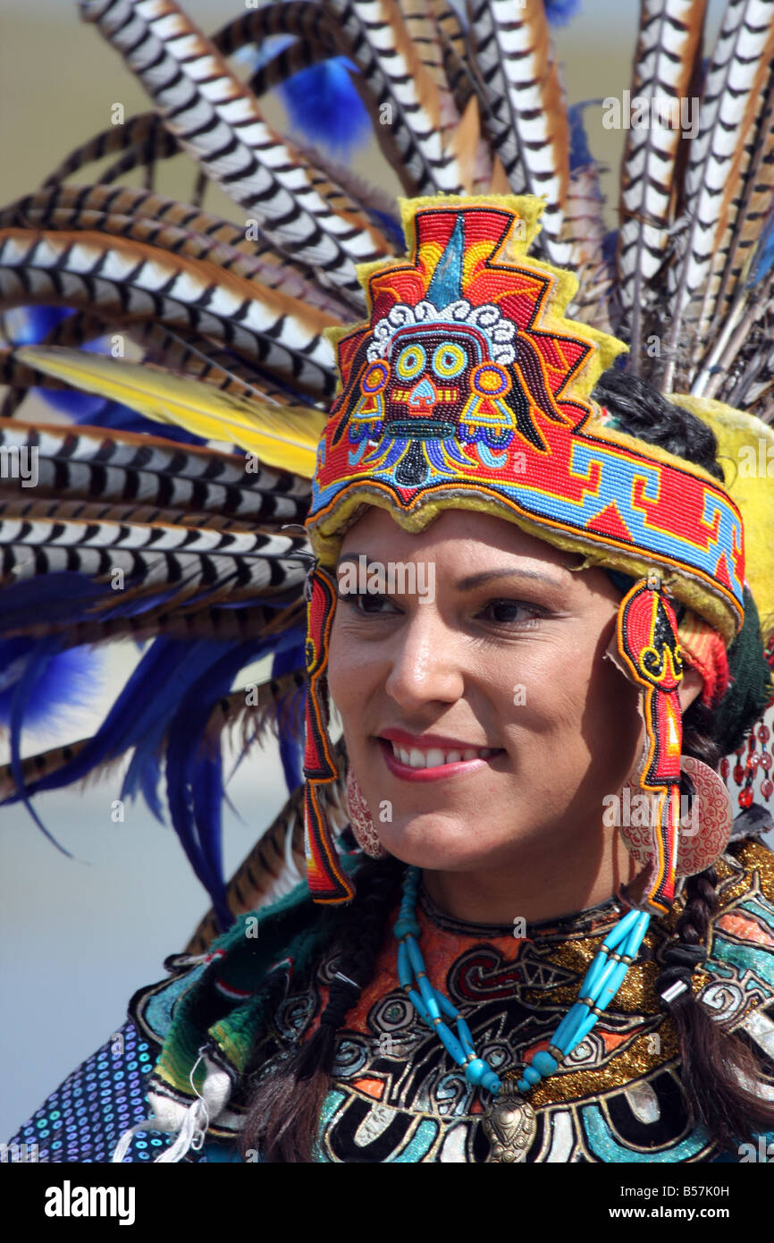 An Incan South American Indian in a fancy feather headdress at the ...