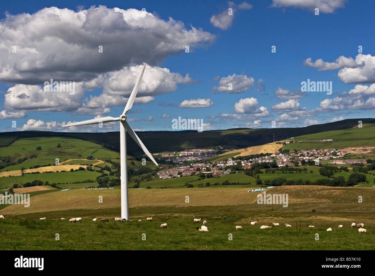 Turbine on Taff Ely Wind Farm, hillside above housing estates near ...