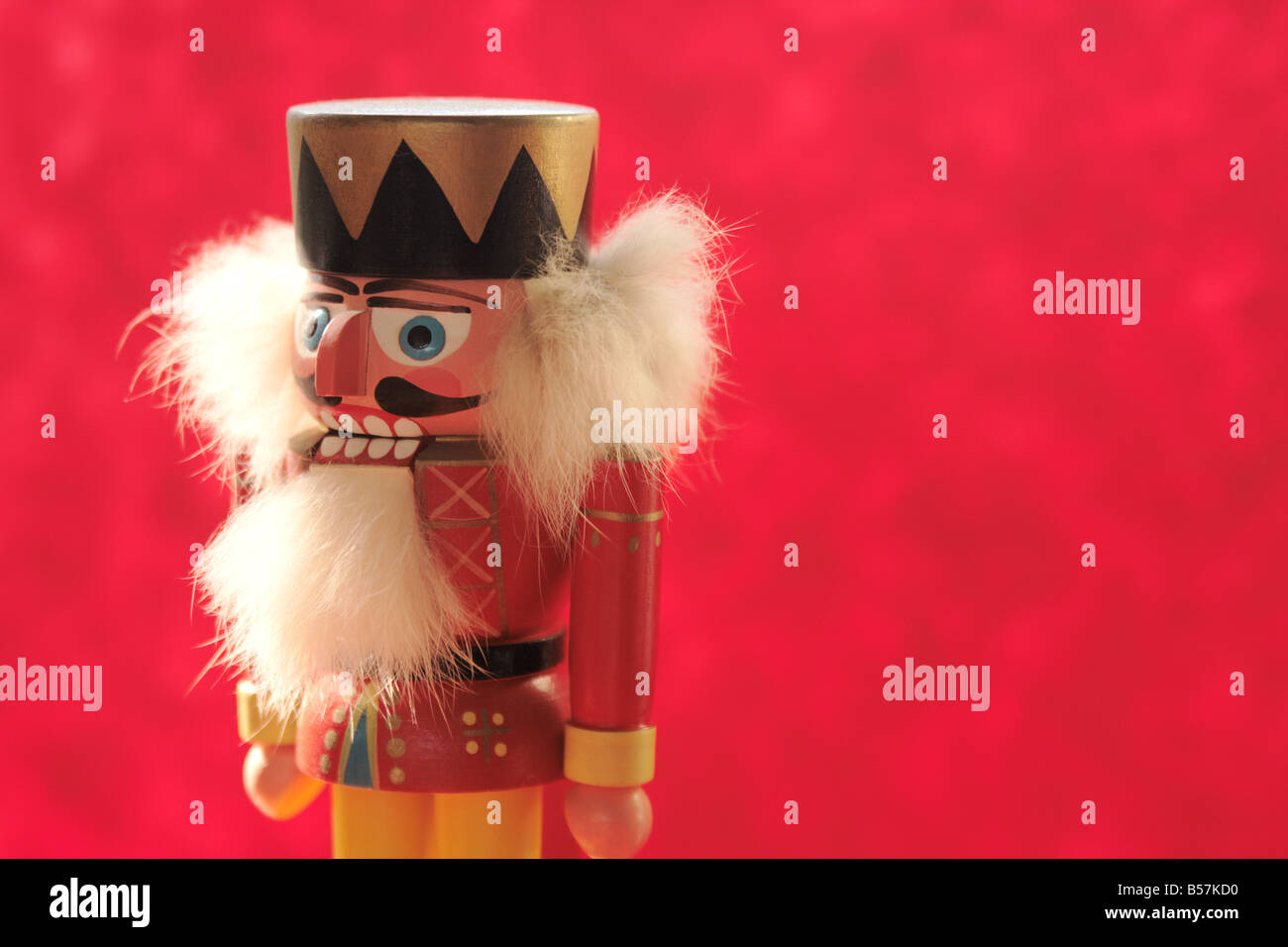 a backlit nutcracker on a red background Stock Photo - Alamy