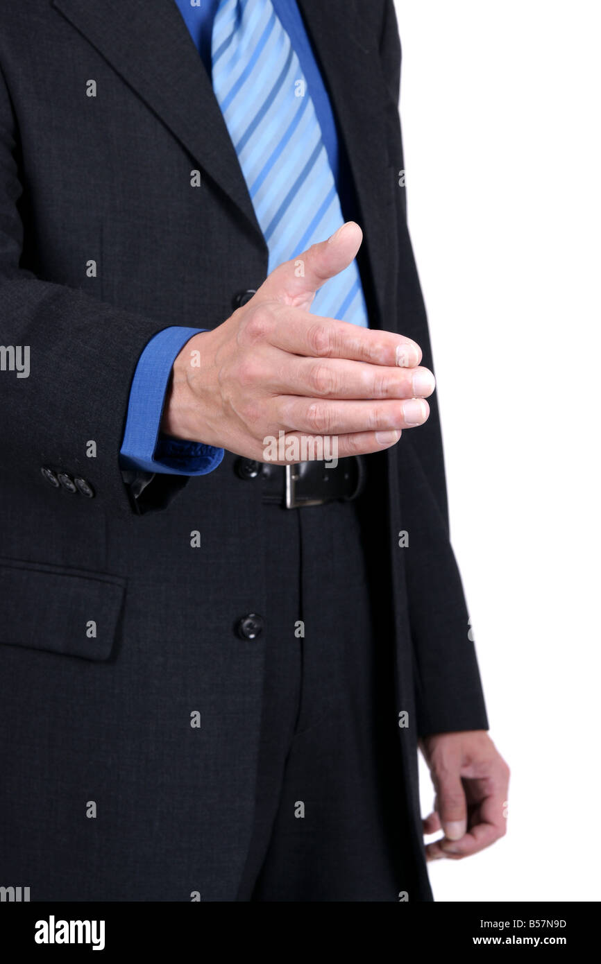 Businessman offering hand for handshake Stock Photo - Alamy