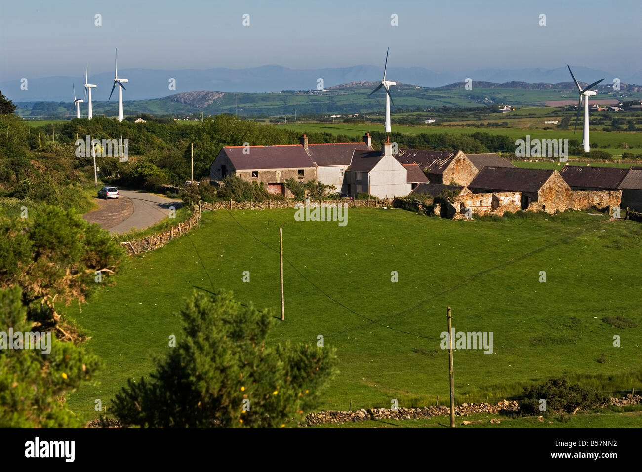Wind power turbines and farm buildings, Trysglwyn Wind Farm, Anglesey ...