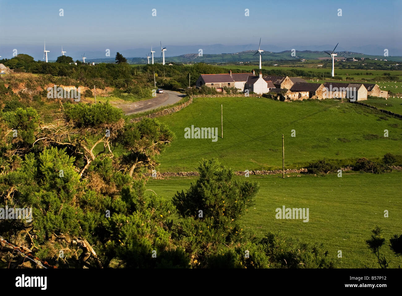 Wind power turbines and farm buildings, Trysglwyn Wind Farm, Anglesey ...