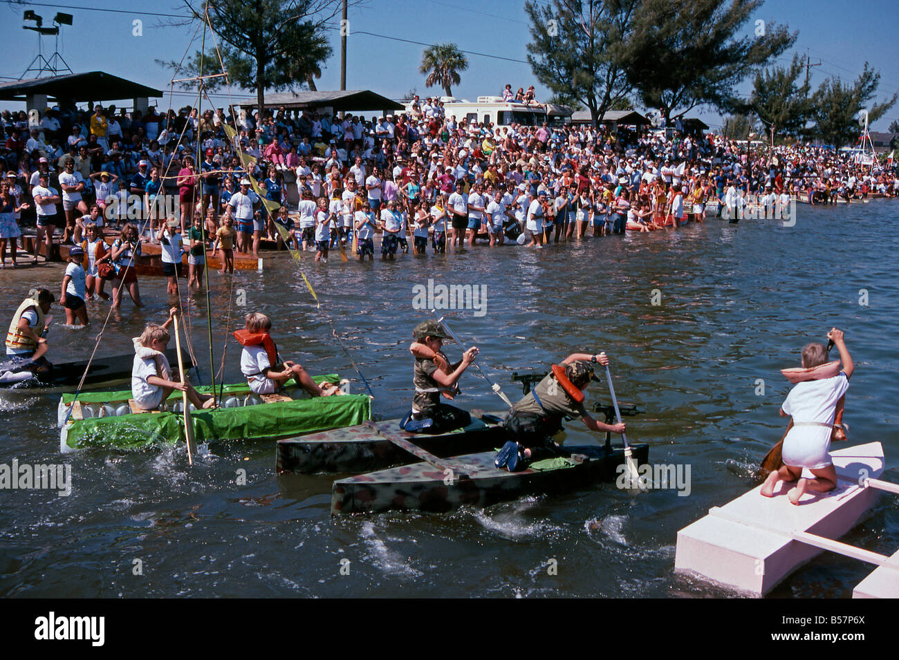 Racing in a children's recycled plastic bottle boat regatta, Bradenton ...