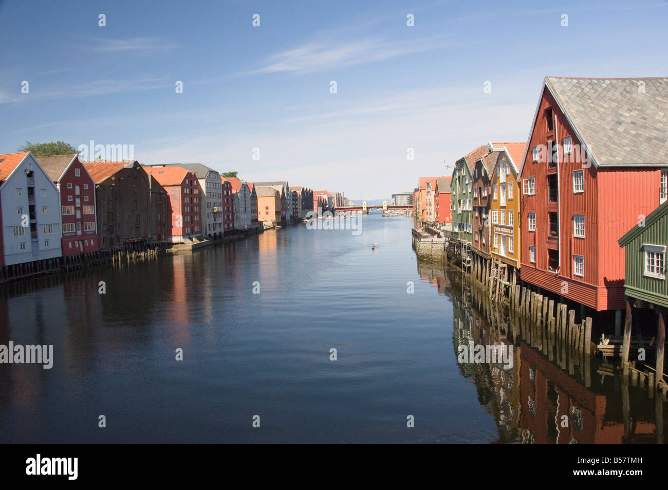 The Nidelva with merchants warehouses each side leading to the old dock ...