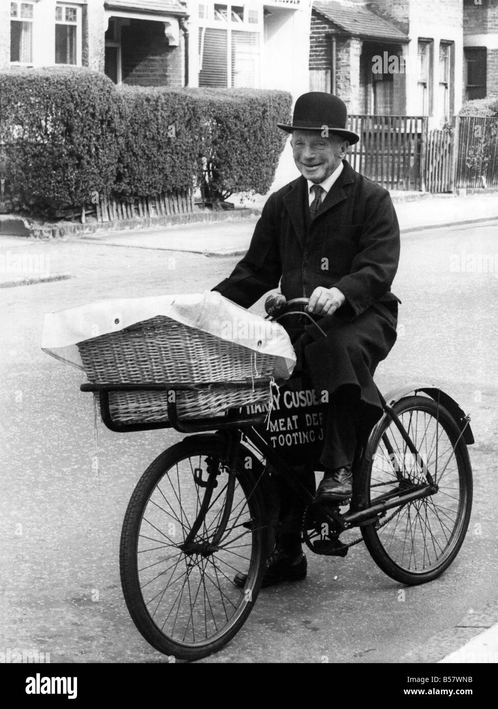 George Rees, Britain's oldest butcher's boy riding on a push-bike. Note ...