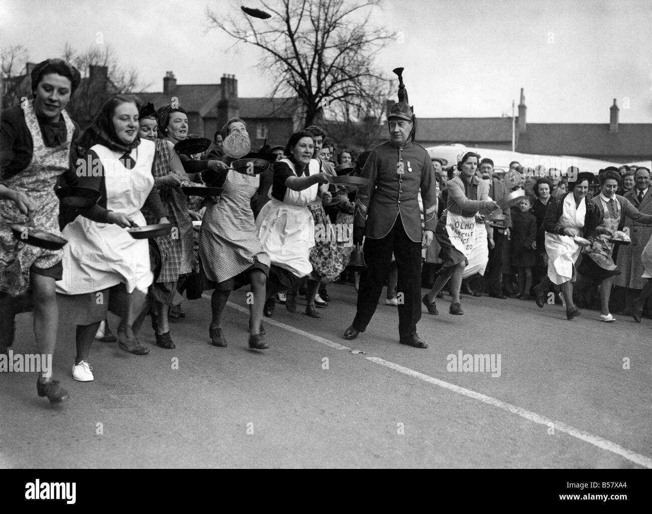 The start of the pancake race in the market square at Olney. February ...
