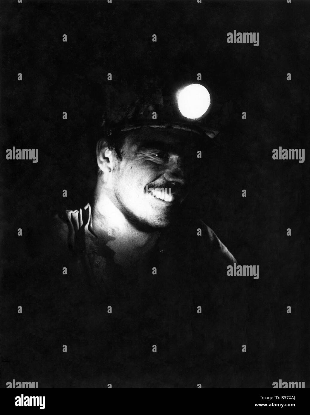 A Miner at work with helmet and head lamp. January 1985 P005131 Stock ...