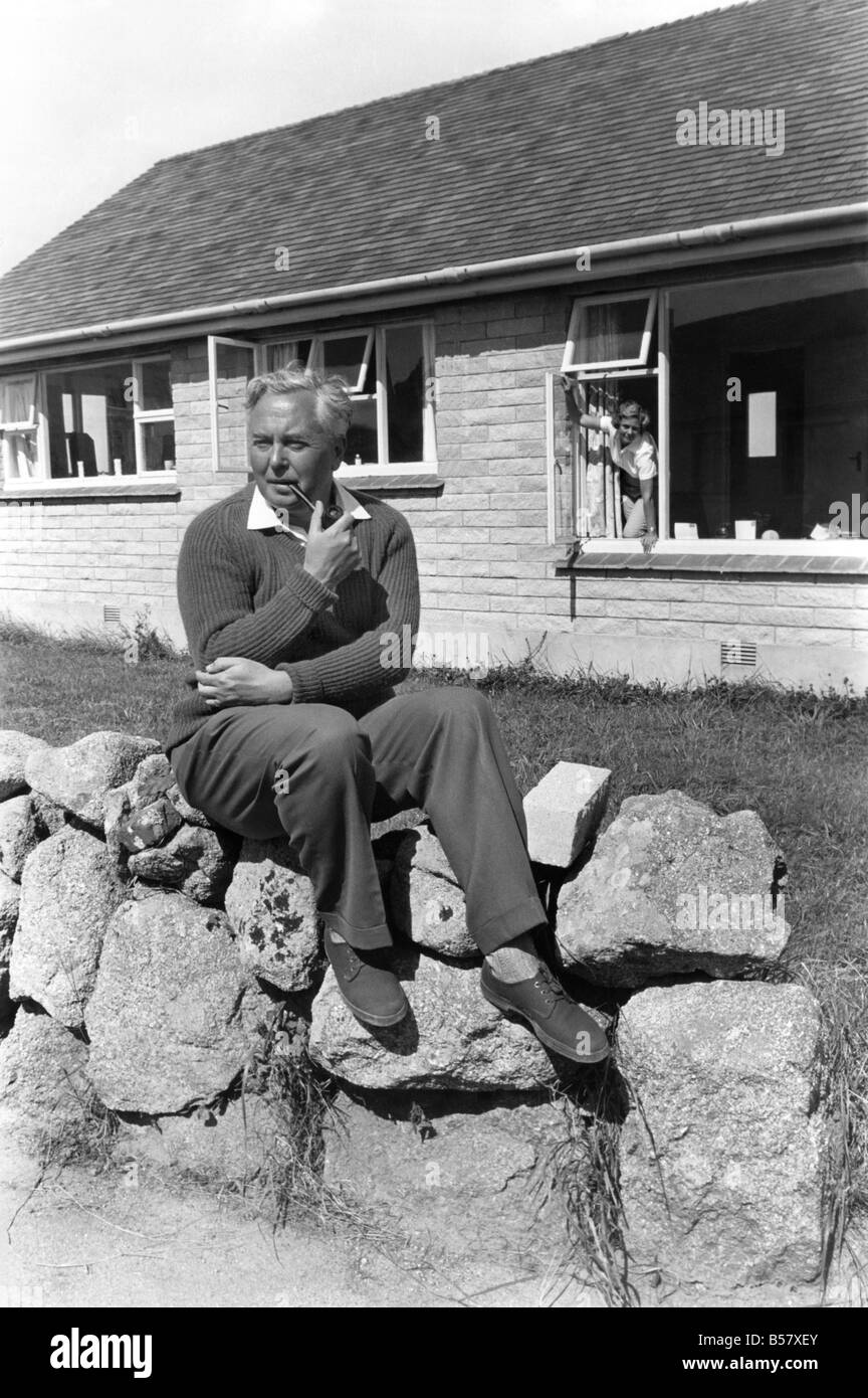 Labour Party leader Harold Wilson on holiday outside his cottage at St ...