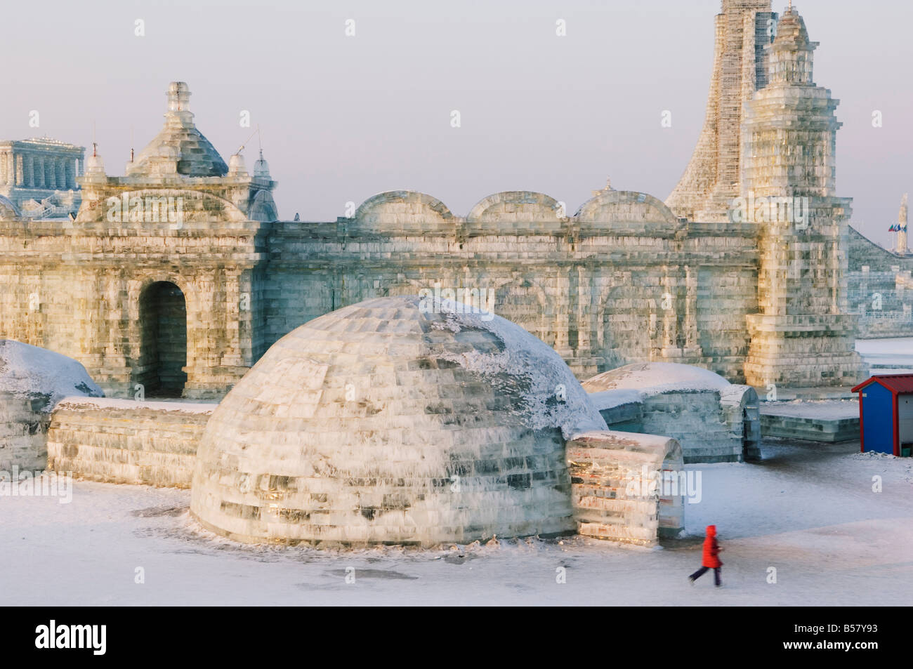 An igloo and snow and ice sculptures at the Ice Lantern Festival ...