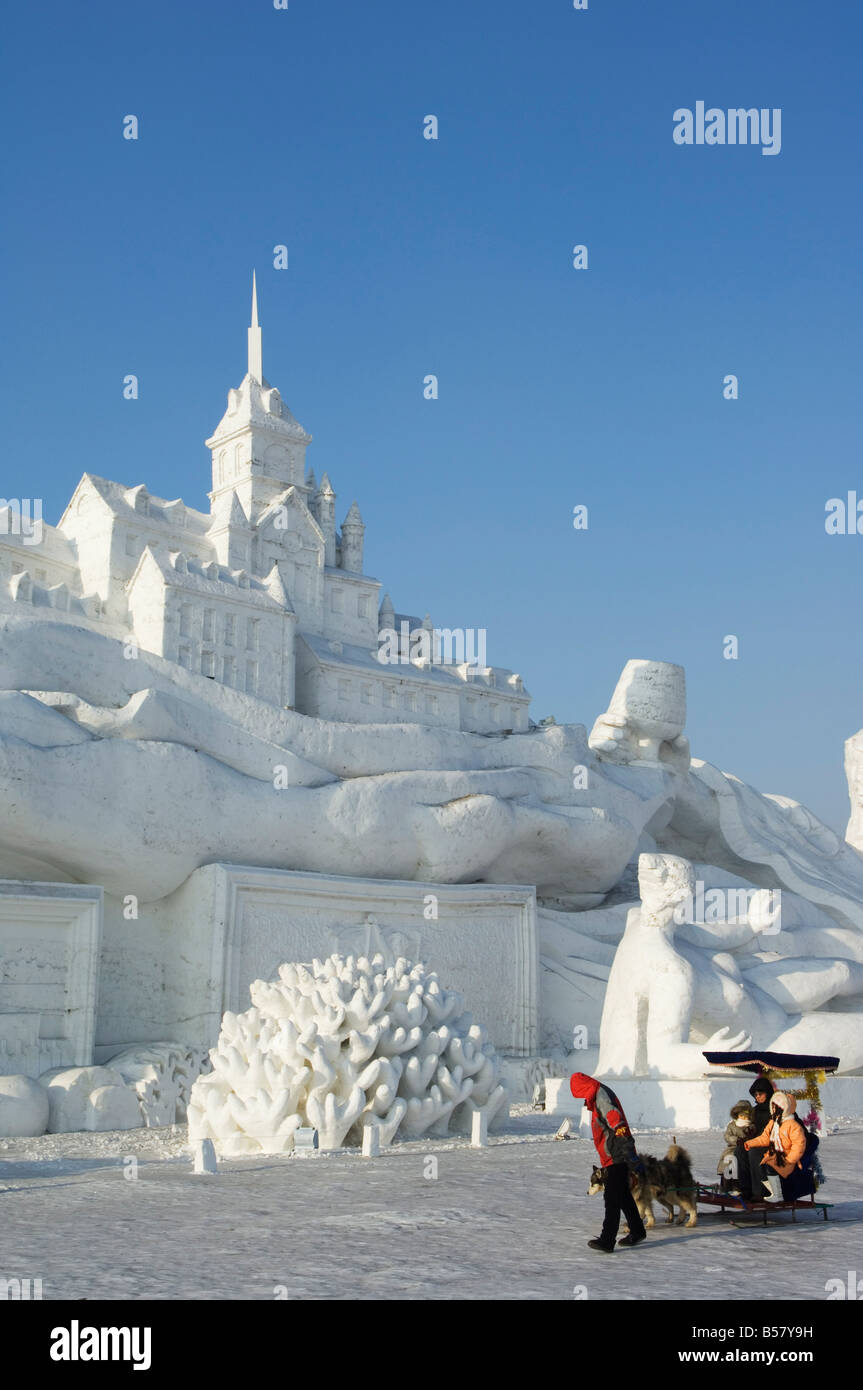 Dog sled ride at the Snow and Ice Sculpture Festival at Sun Island Park ...