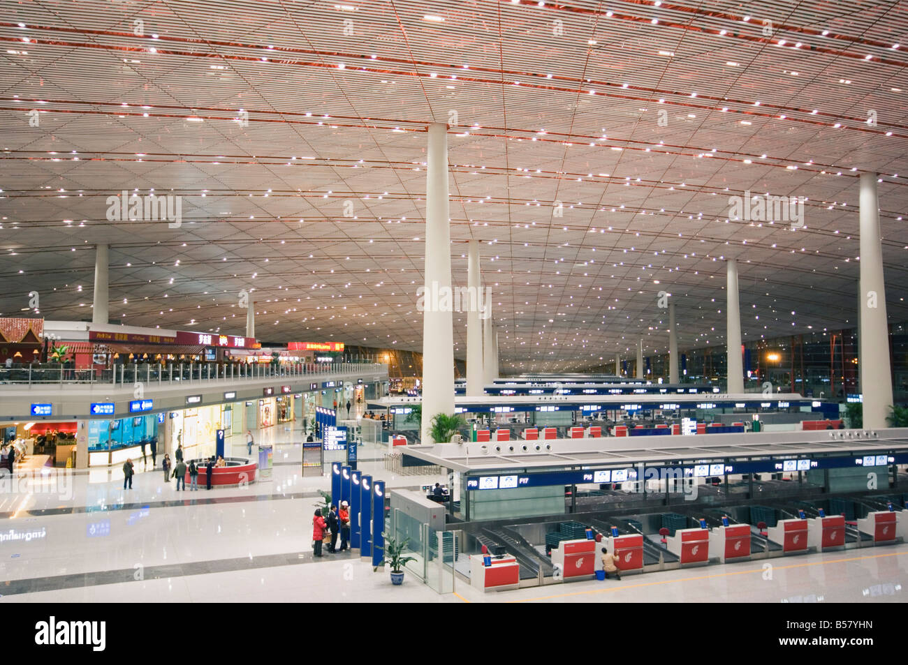Check-in counters at Beijing Capital Airport, part of new Terminal 3 ...