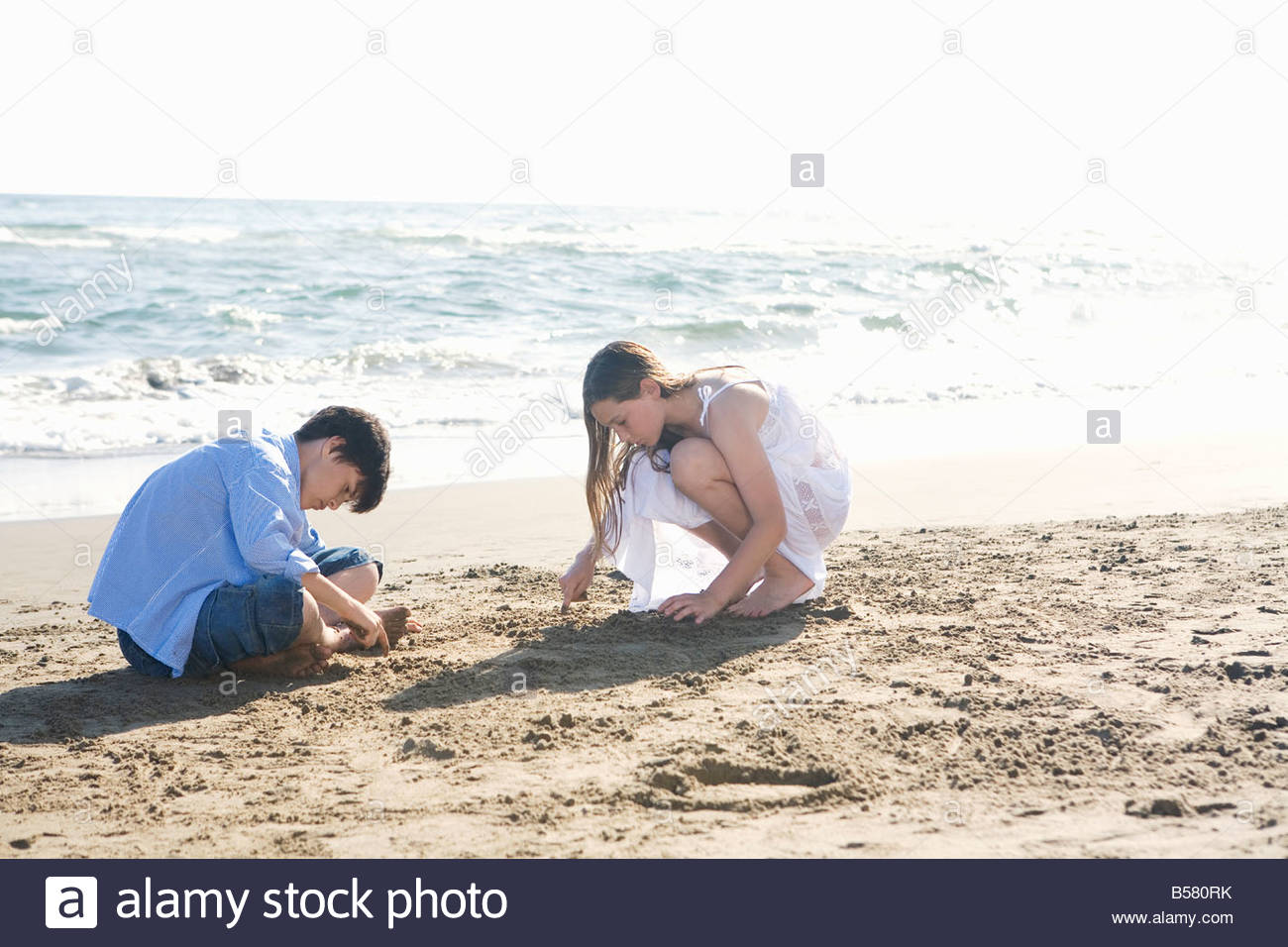 Sand Drawing Friends Stock Photos & Sand Drawing Friends Stock Images ...
