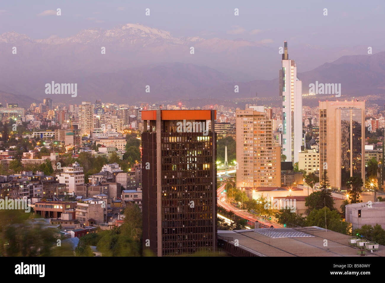City skyline and the Andes mountains at dusk, Santiago, Chile, South ...