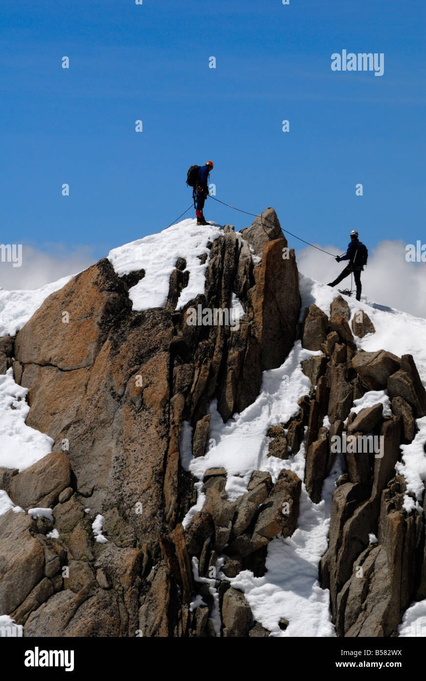 Mountain Climbers Helping Stock Photos & Mountain Climbers Helping ...