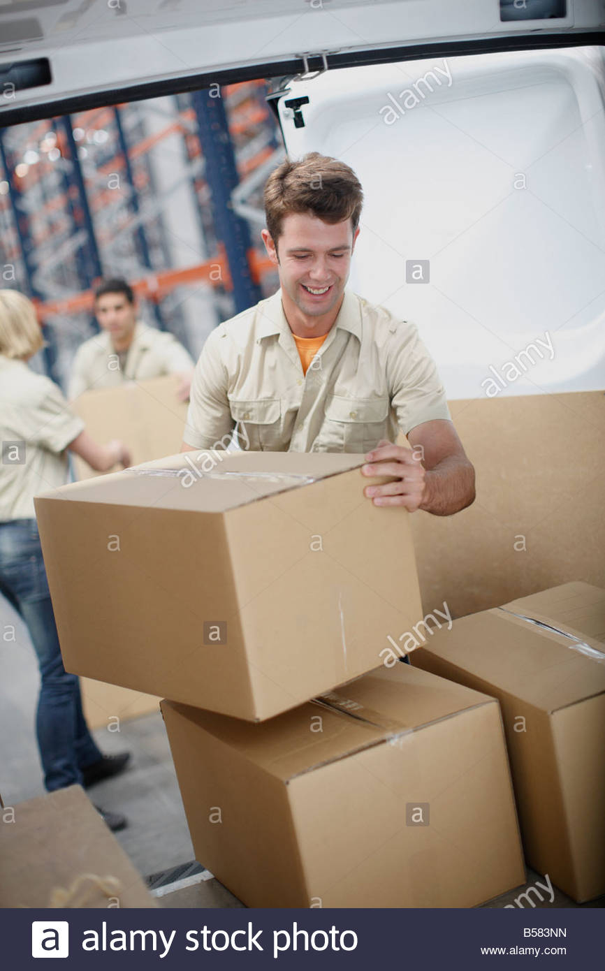 Man loading boxes into truck Stock Photo, Royalty Free Image: 20462225 ...