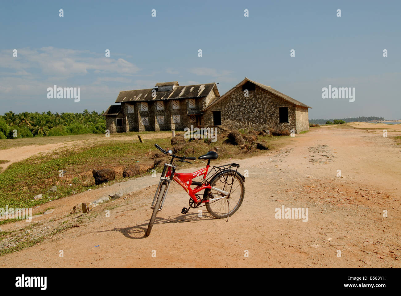 A cycle in front of an old Building Stock Photo - Alamy