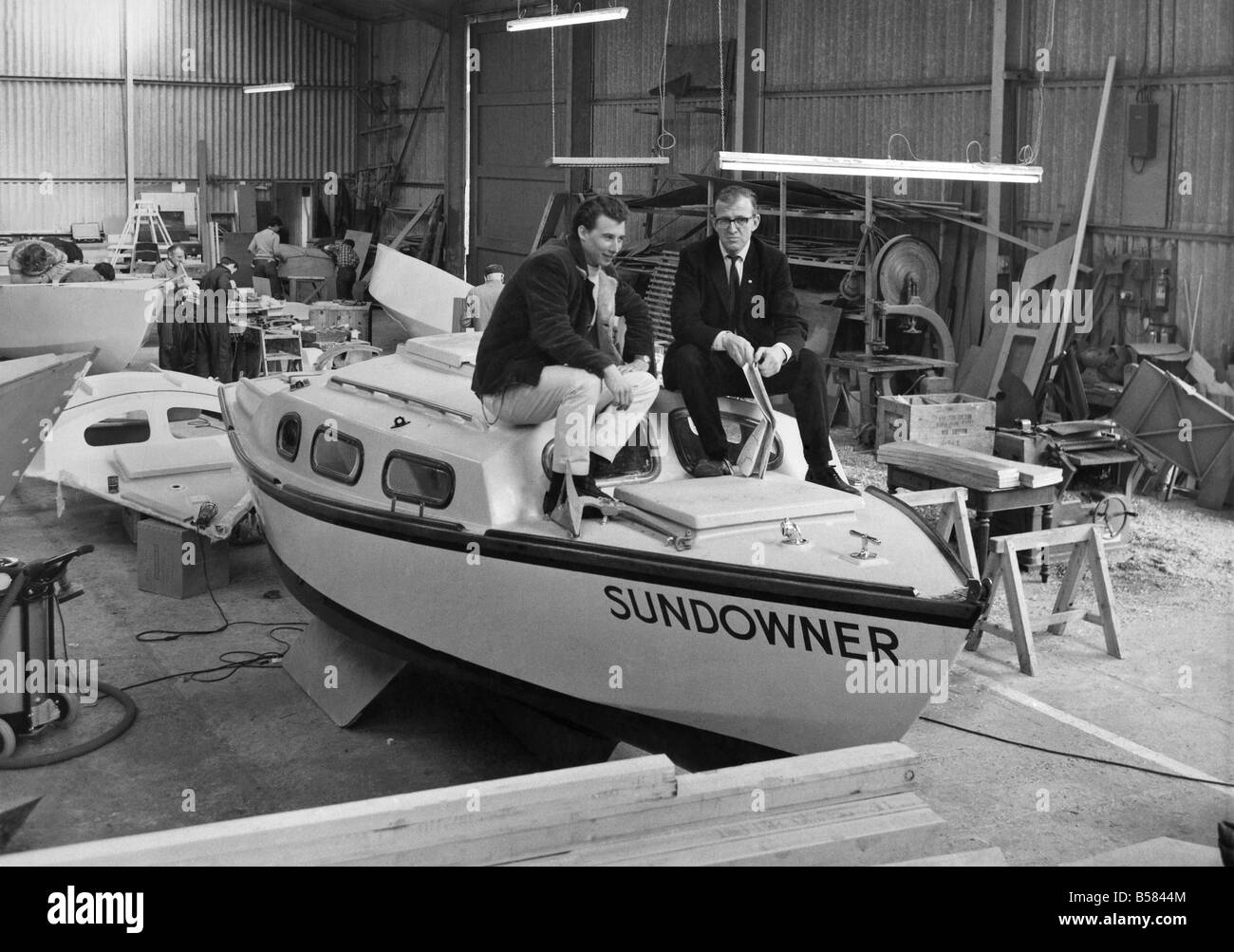 Geoff Godwin and Larry Rodney with the boat Sundowner which they plans ...