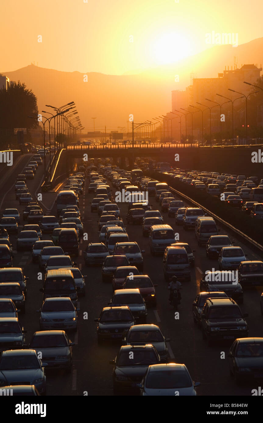 Sunset over city ring road during rush hour, Beijing, China, Asia Stock ...