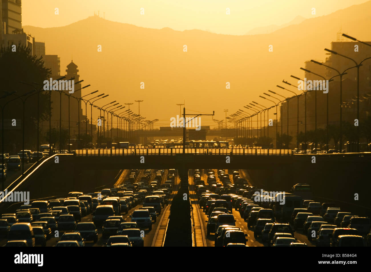 Sunset over city ring road during rush hour, Beijing, China, Asia Stock ...
