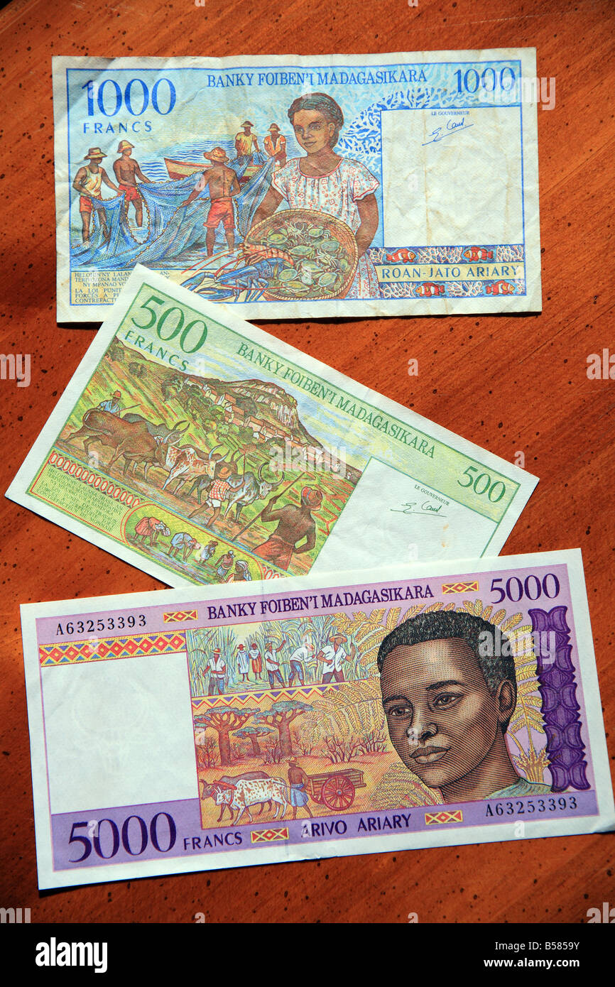 Madagascar francs currency bills on table Stock Photo - Alamy