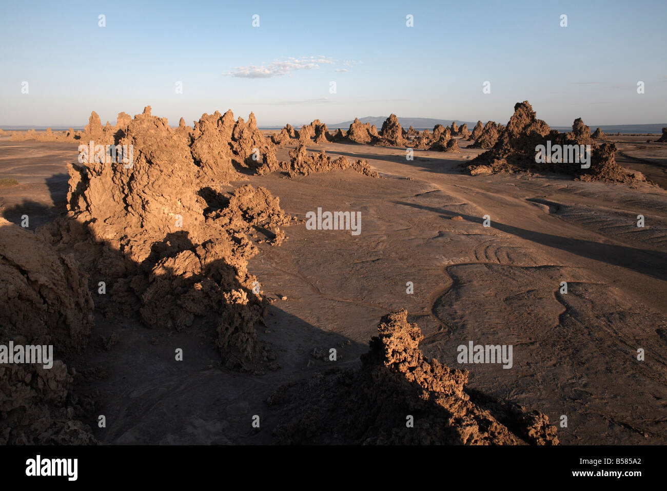 The desolate landscape of Lac Abbe, dotted with limestone chimneys ...