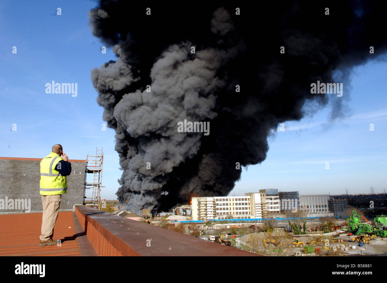 Smoke billows from a derelict warehouse fire at Hackney Wick East ...