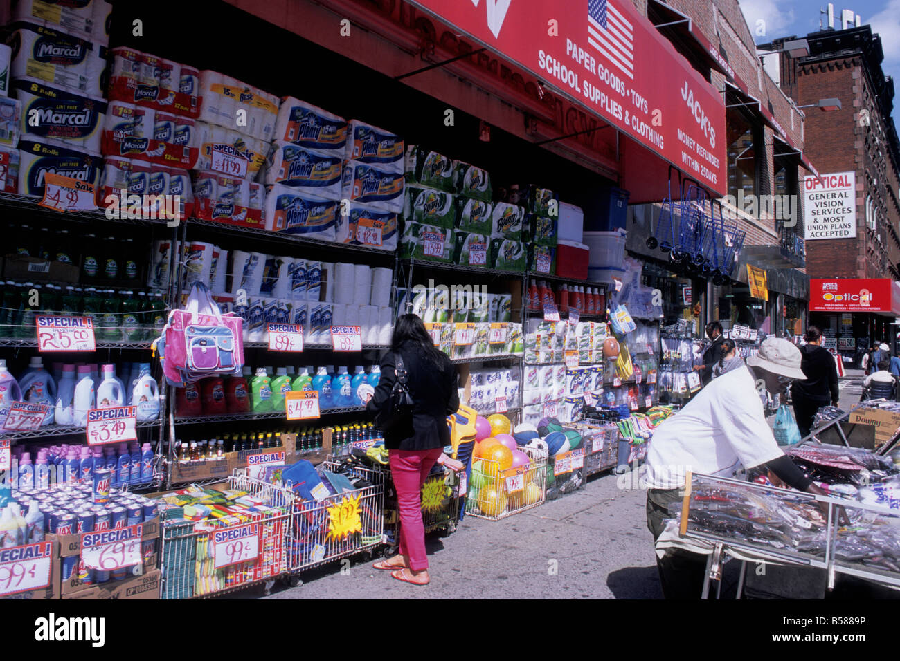 Harlem, New York City household shopping and marketing. Outdoor street ...