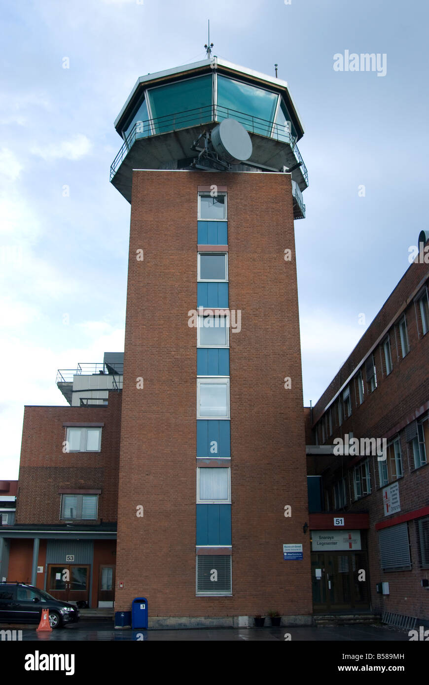 Red brick building and control tower at the old Fornebu Airport in Oslo ...