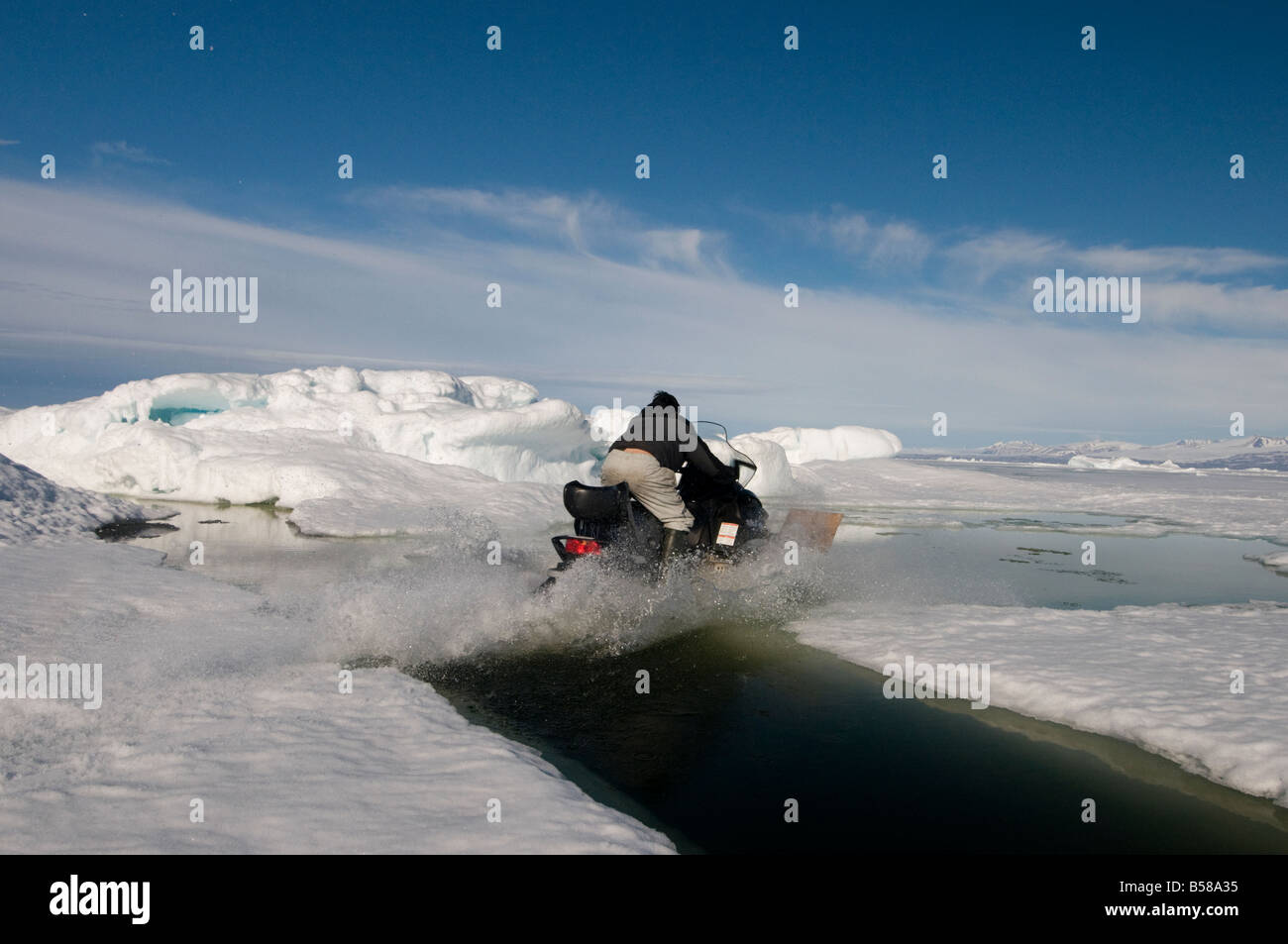 Snowmobile inuit hi-res stock photography and images - Alamy